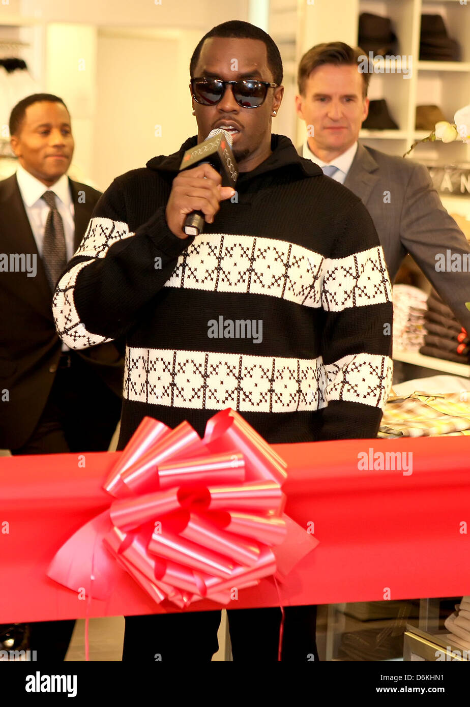Sean Combs aka Diddy attends a ribbon cutting to celebrate the opening ...