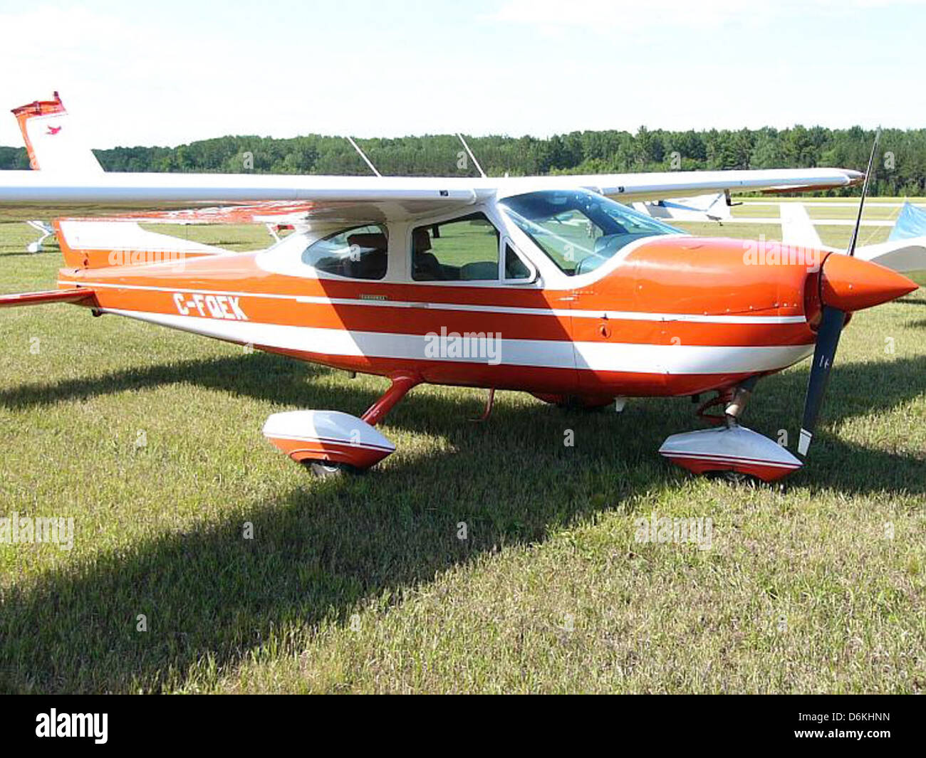 This image features a Cessna 177C, a light aircraft known for its high ...