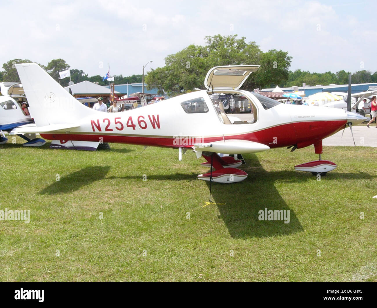 A photo of a Cessna 350 aircraft in flight, capturing the aircraft's ...