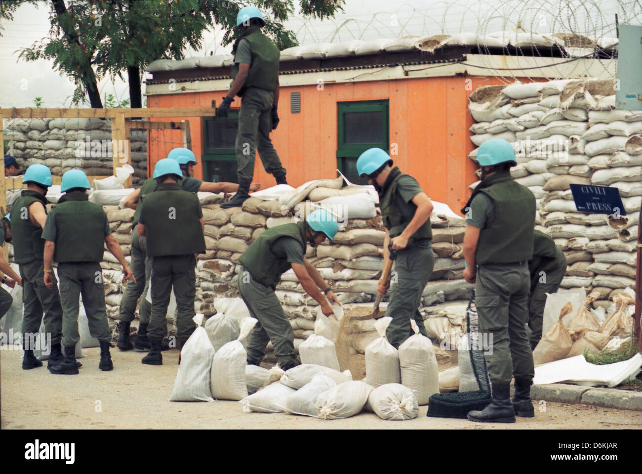 French UN soldiers preparing sandbags, Sarajevo, Bosnia and Herzegovina ...