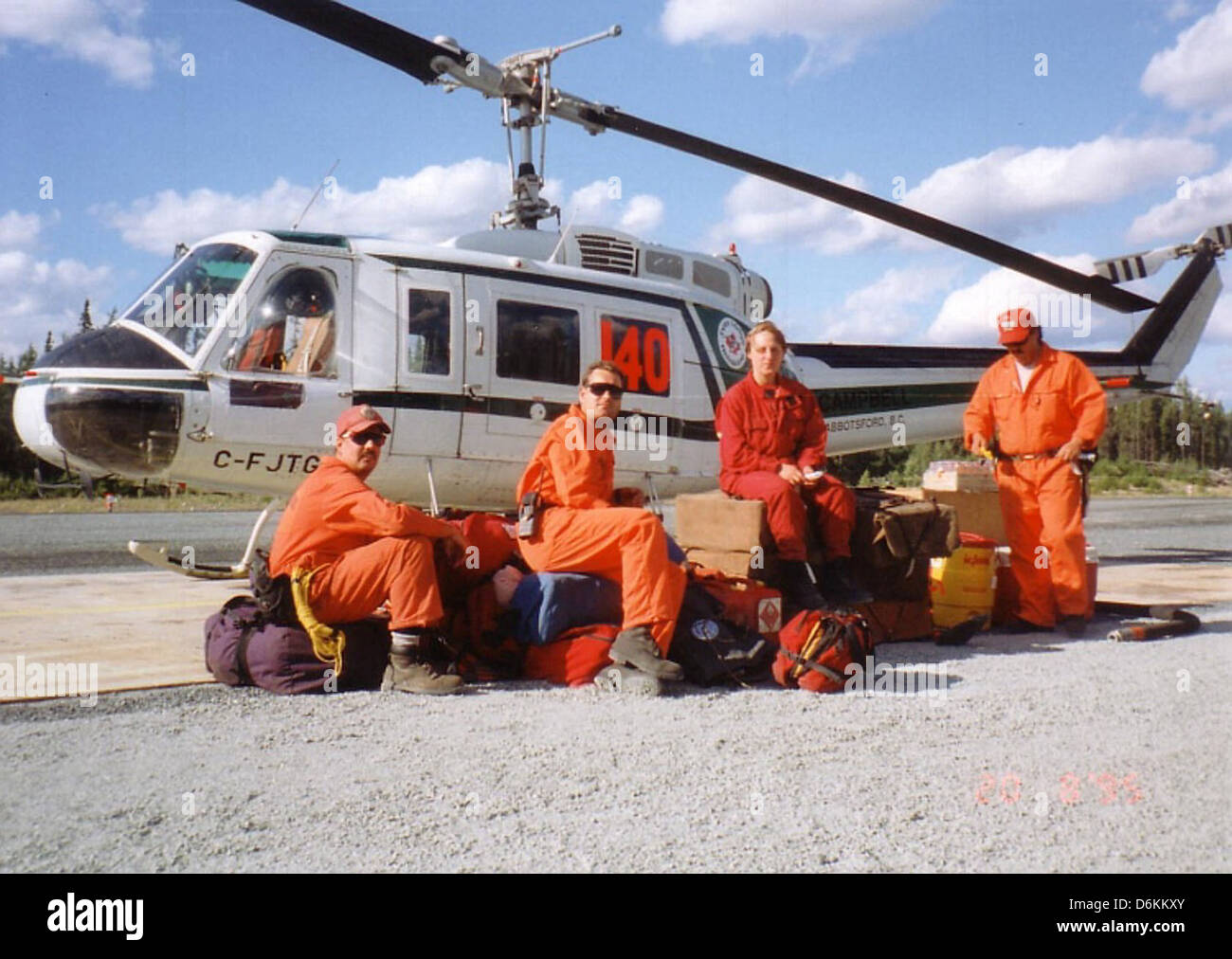 A photo showing a helitack crew in action, with members preparing for ...