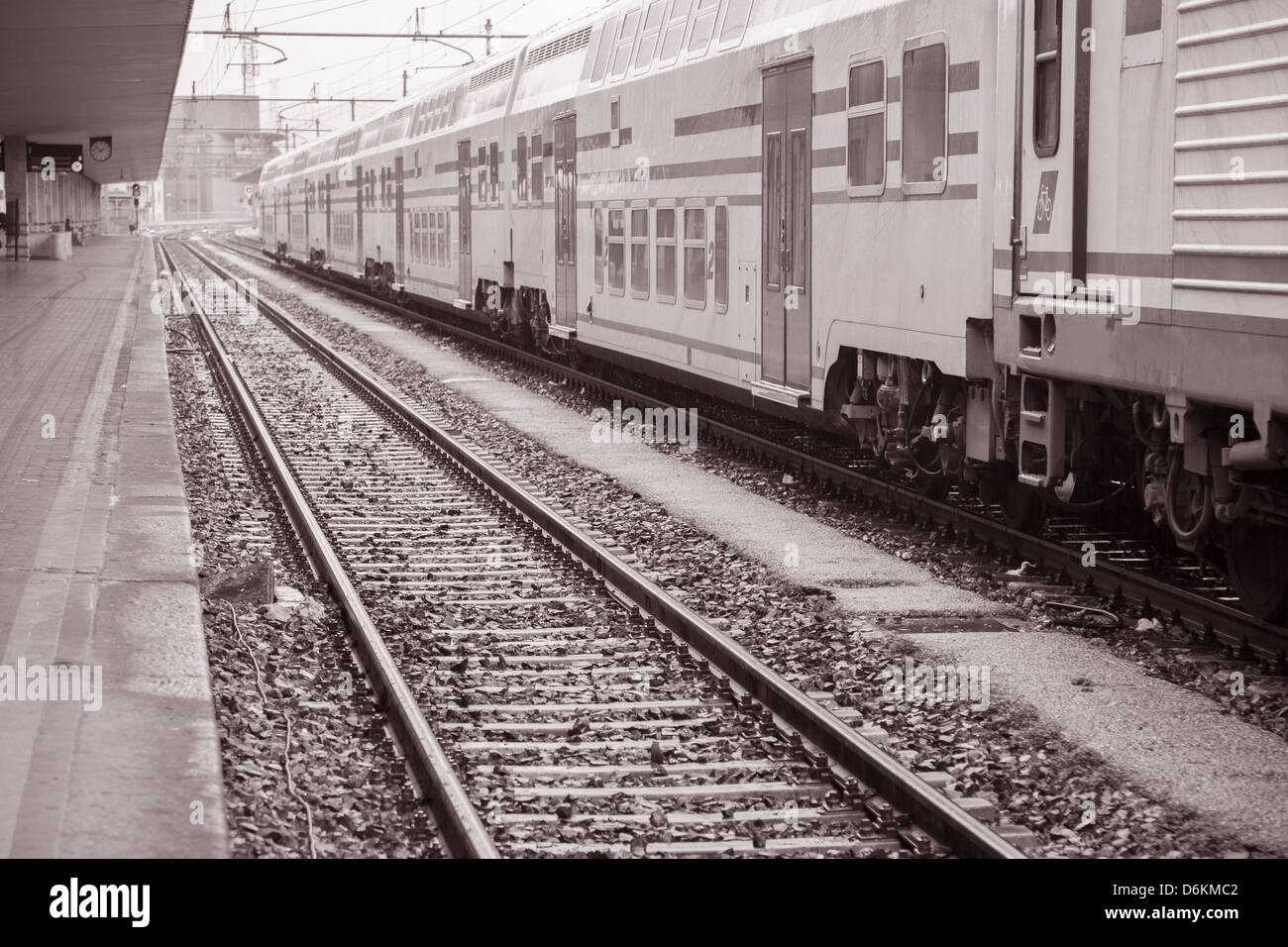 Railroad Platform with Train and Trackin Black and White Sepia Tone ...