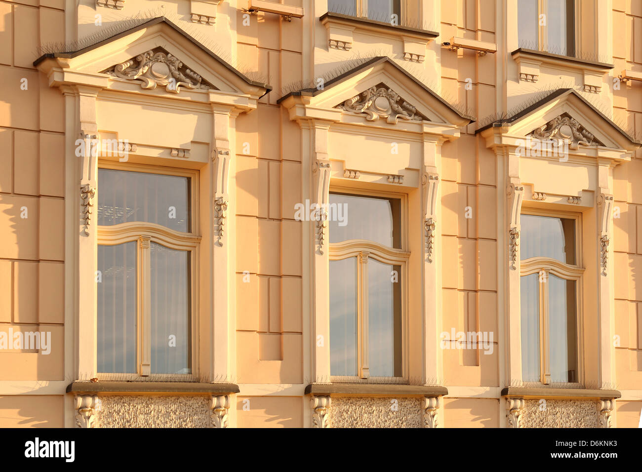 Three windows with ornamental decoration- Krakow, Poland Stock Photo ...