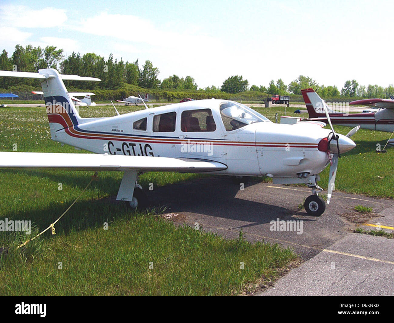 A photograph of the Piper PA-28RT-201 Arrow IV, a small general ...
