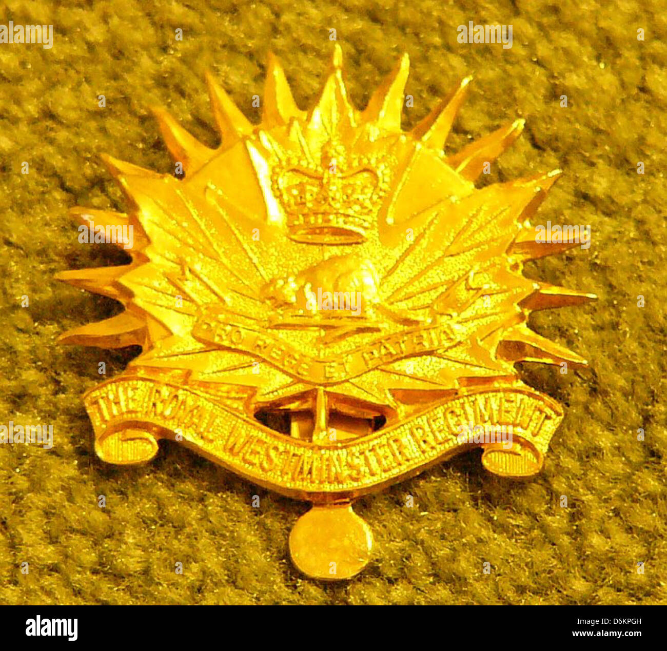 A detailed view of the hat badge of the Royal Westminster Regiment, a ...