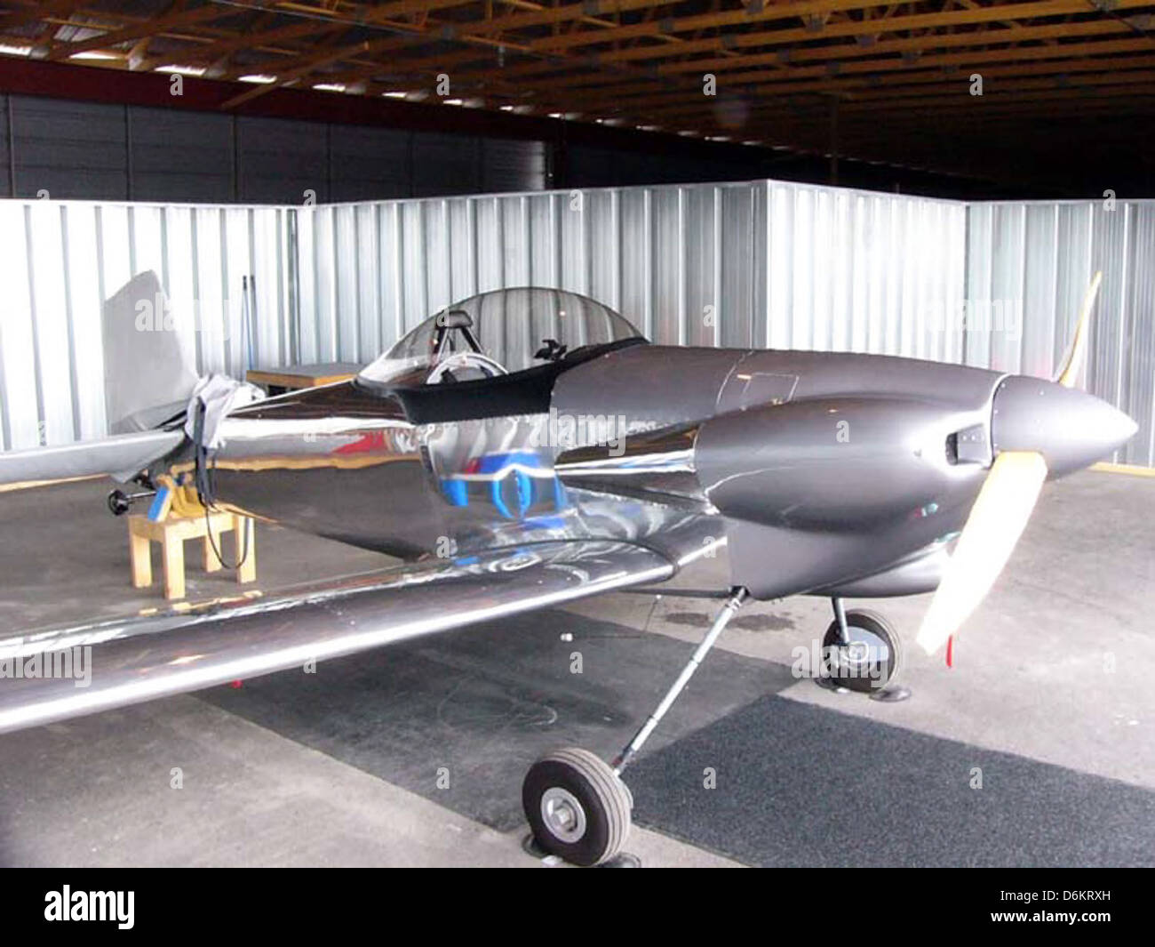 This image features a Vans RV-30 aircraft, known for its sleek design ...