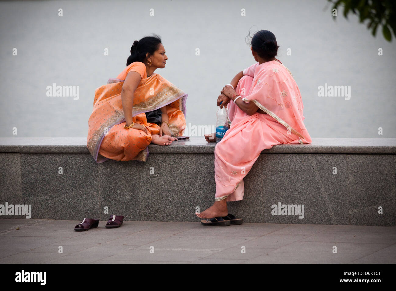 Women chatting by the lake, Ahmedabad, India Stock Photo - Alamy