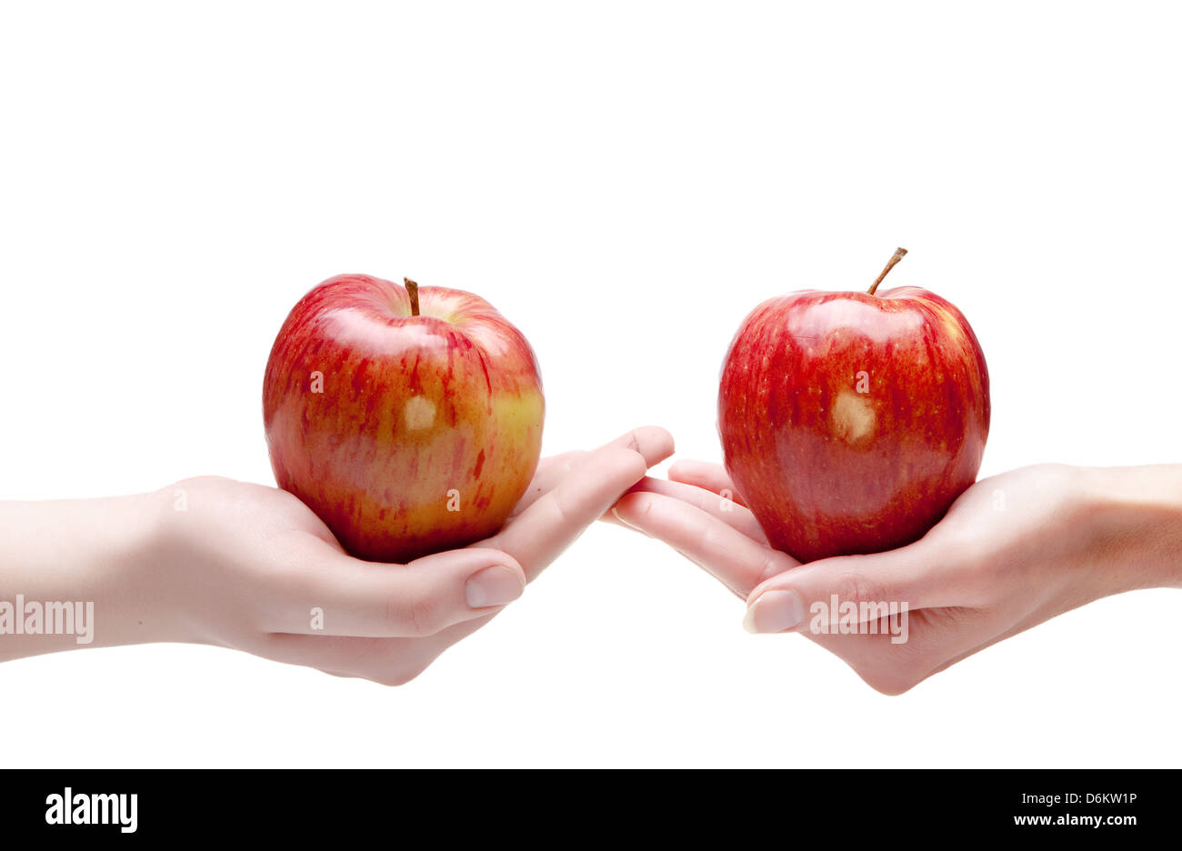 Hands and apple Cut Out Stock Images & Pictures - Alamy