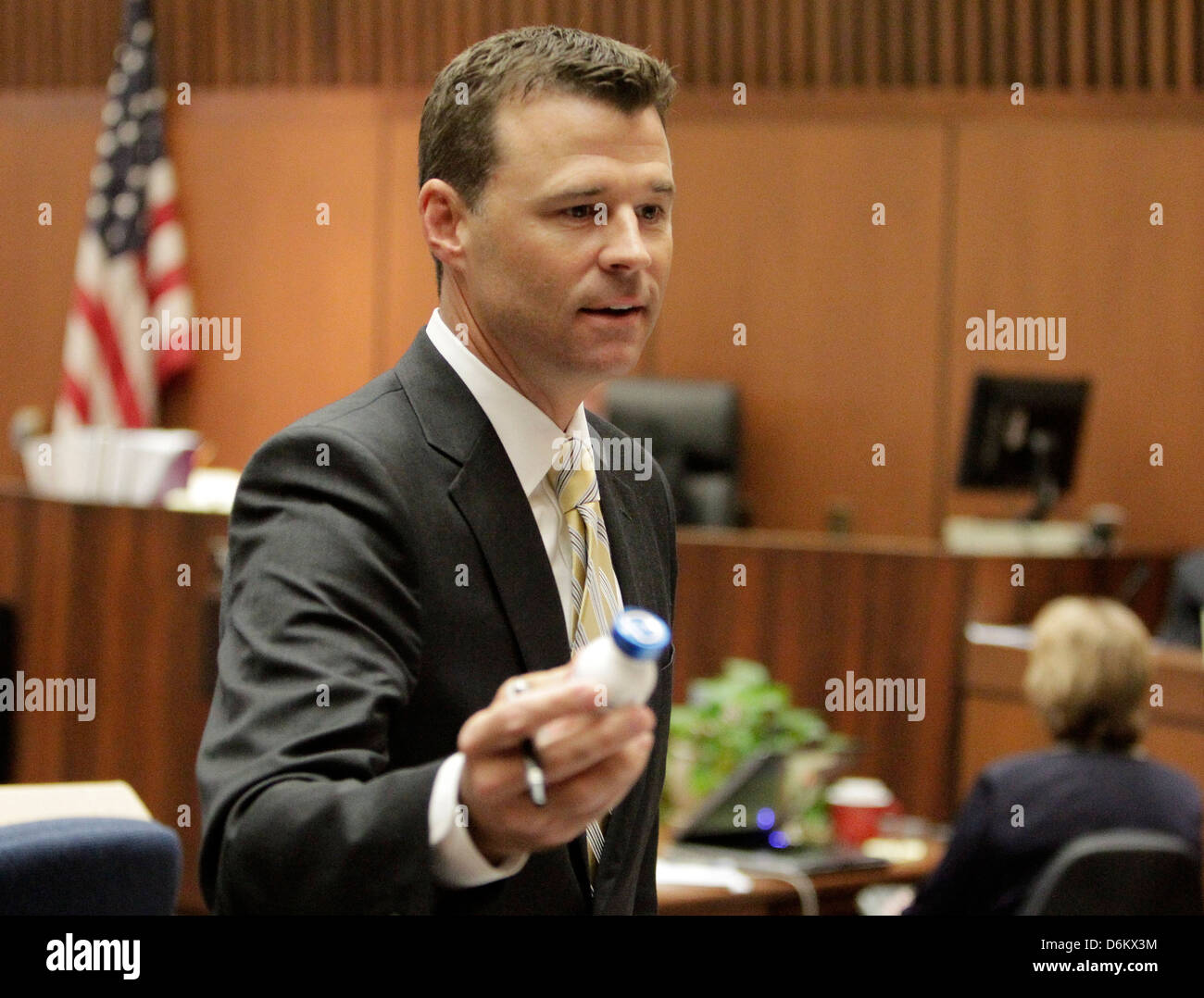 Deputy district attorney David Walgren holds a Propofol bottle during ...