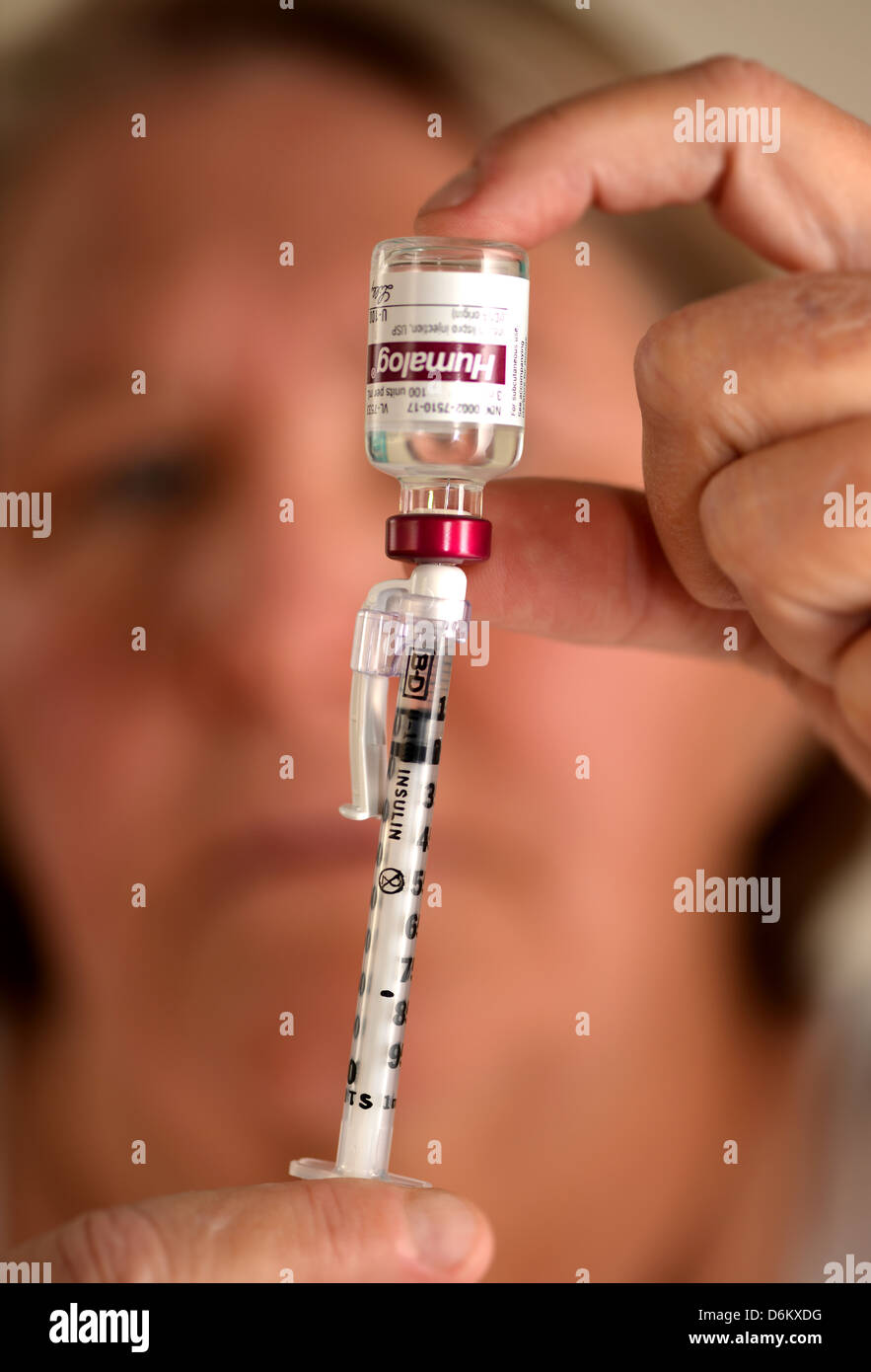 Insulin syringe hi-res stock photography and images - Alamy