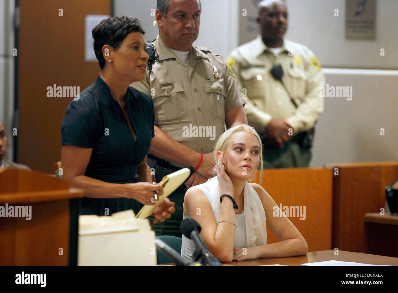 Lawyer Shawn Chapman Holley and Lindsay Lohan Lindsay Lohan with her ...