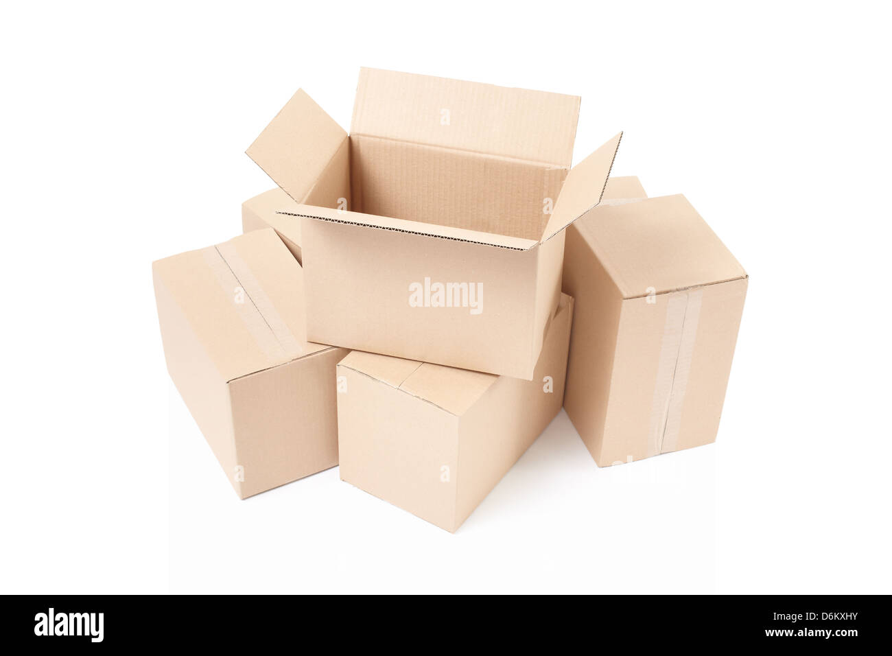 Open cardboard box on top of others isolated on white, clipping path ...