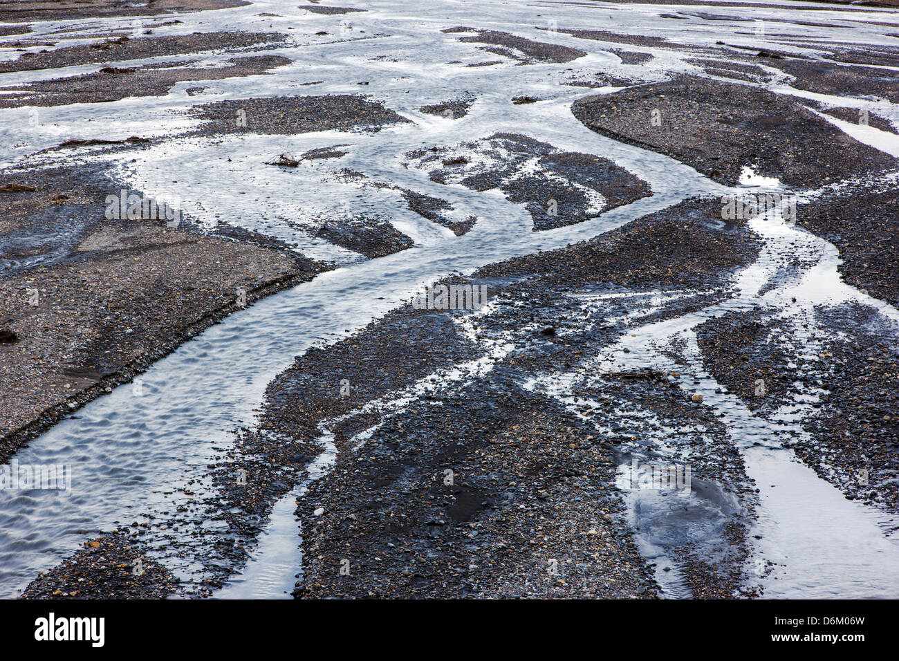 Dusk skies reflect in the braided East Fork of the Toklat River, Denali ...