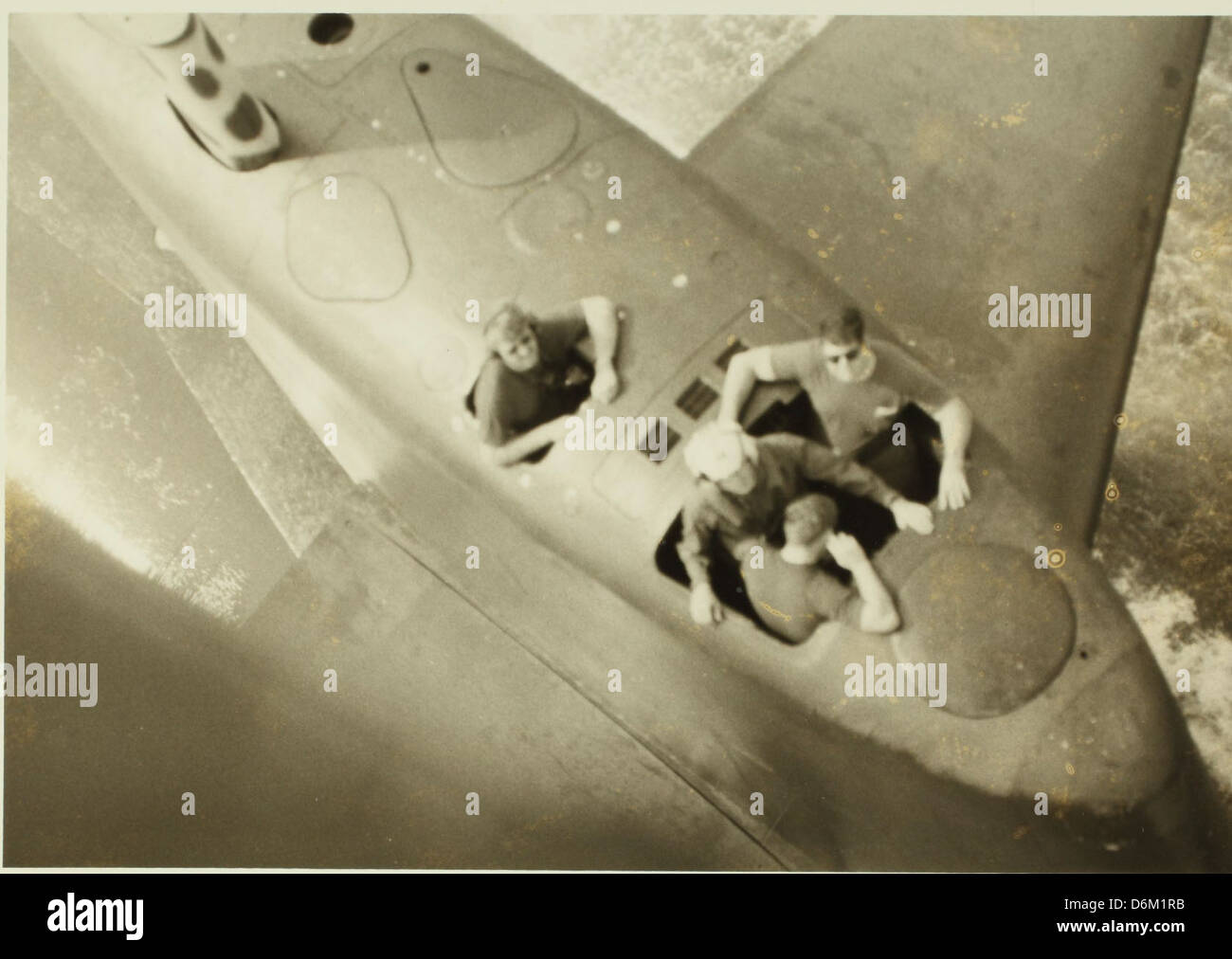 This photo shows a pilot aboard a submarine, highlighting the role of ...