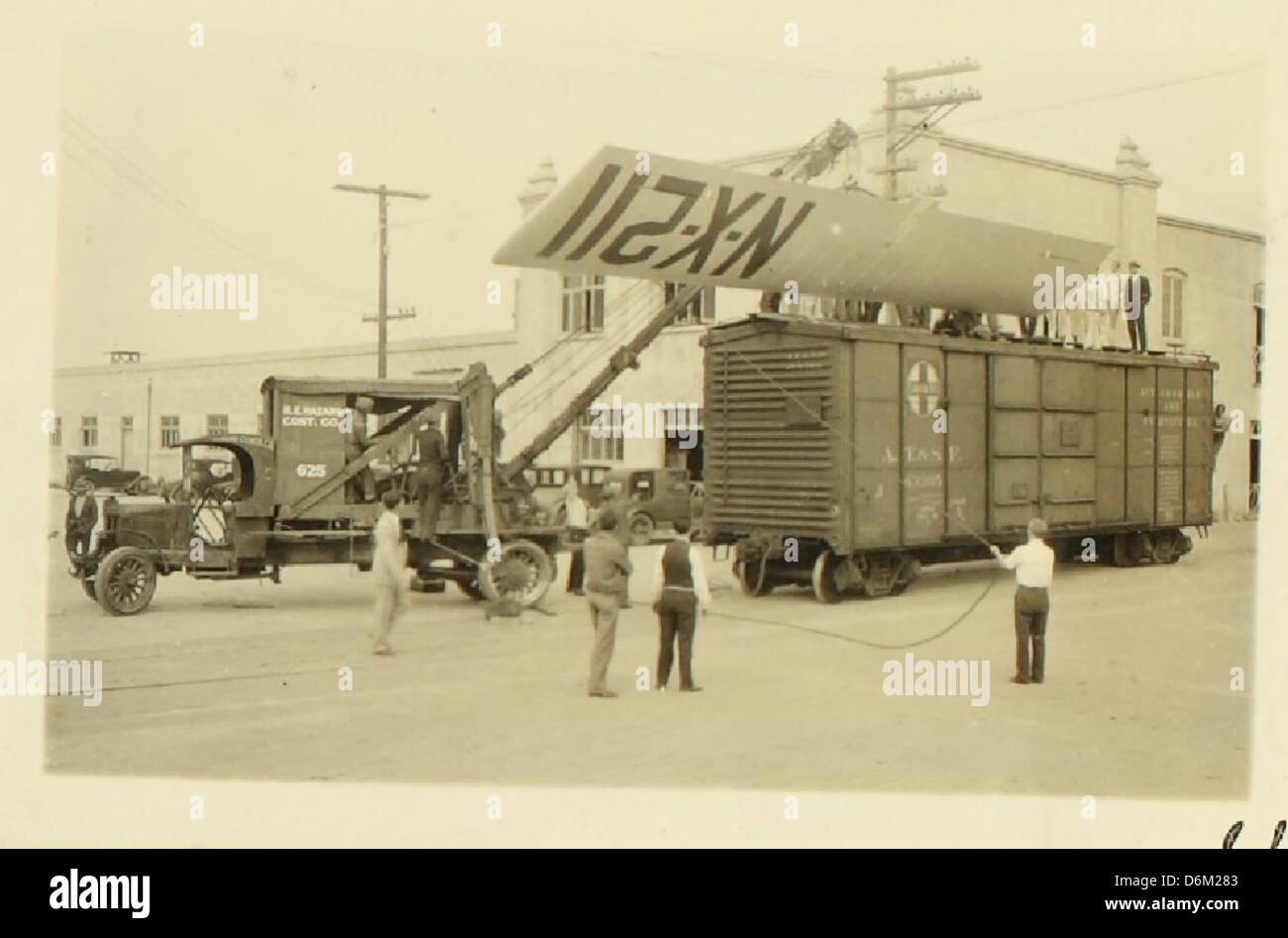 The wing of the Spirit aircraft is carefully lifted by a crane and ...