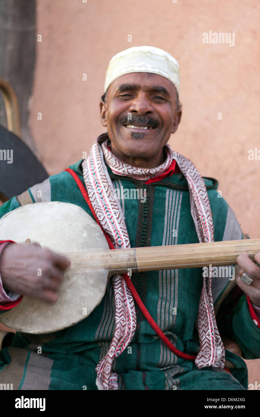 Morocco, musician at the walls of the ancient Kasbah Stock Photo - Alamy