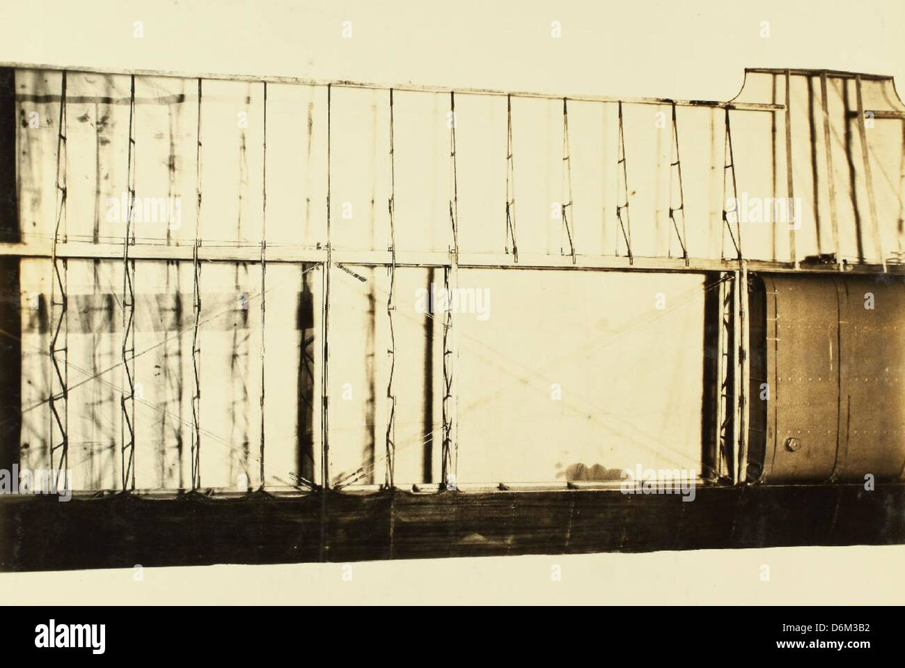 This close-up image shows the detailed wing structure of an aircraft ...