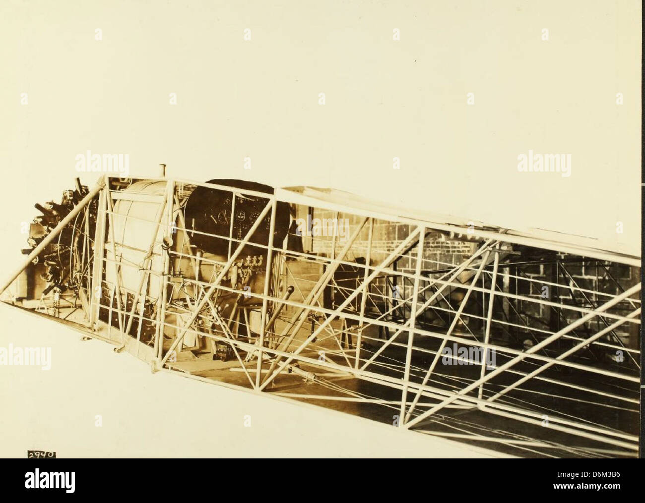 An uncovered aircraft fuselage frame reveals the skeletal structure and ...