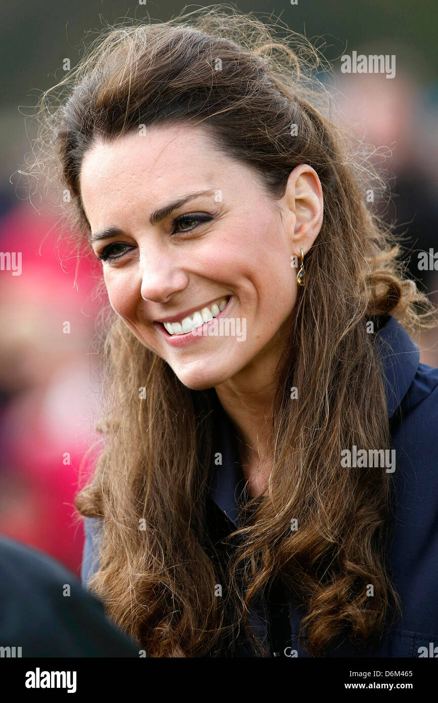 Kate Middleton reacts to the crowd, during a visit to Witton County ...