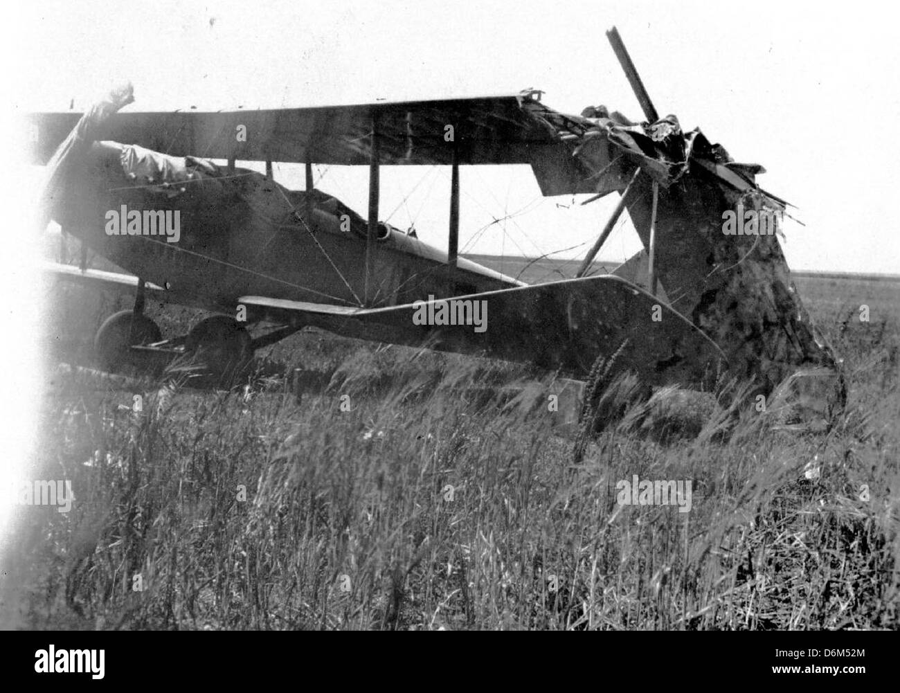 This image features Louis Seeman with a Glen L. Martin Company aircraft ...