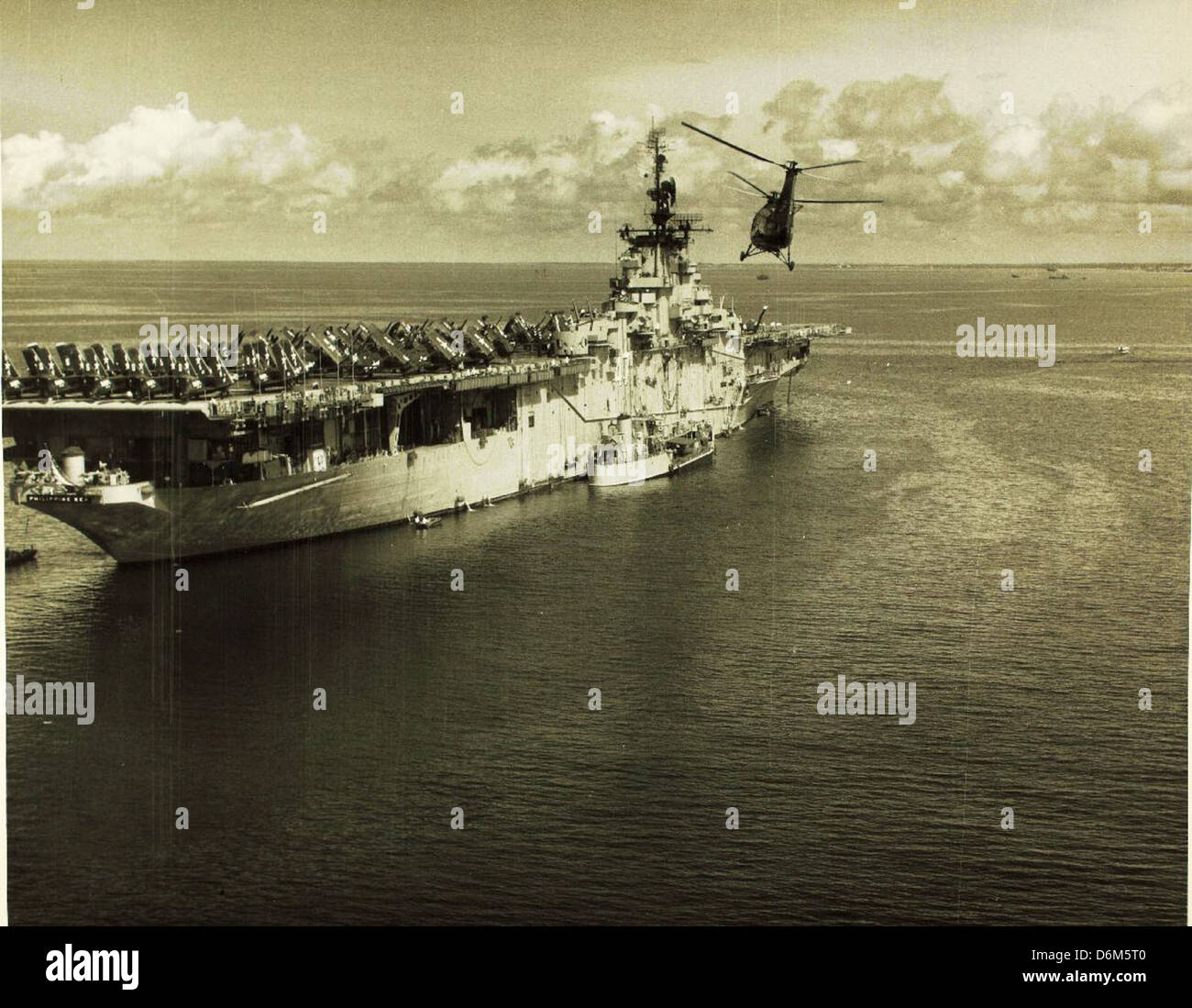 This photograph shows a HUP helicopter operating aboard the USS ...