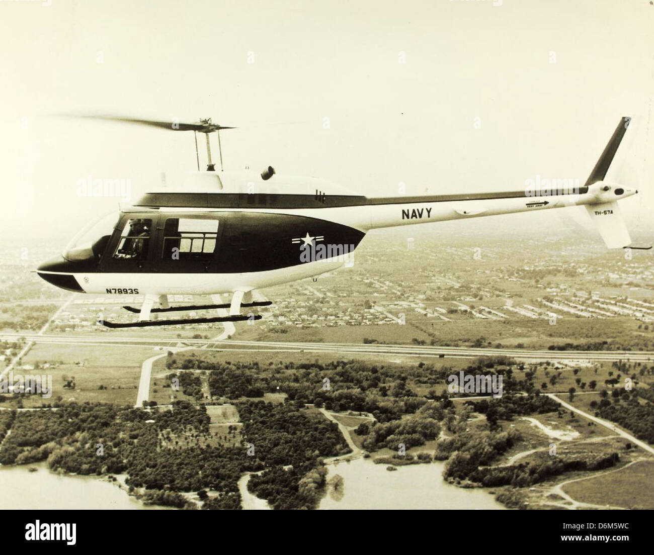 Bell helicopter in flight NHHS Photo Stock Photo - Alamy