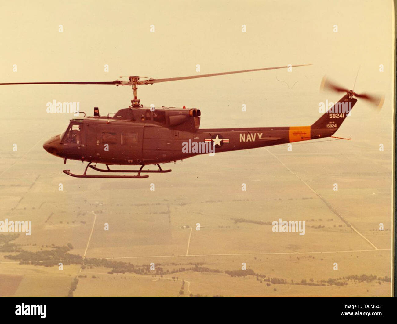 This image shows a Bell UH-1N Twin Huey helicopter, specifically BuNo ...