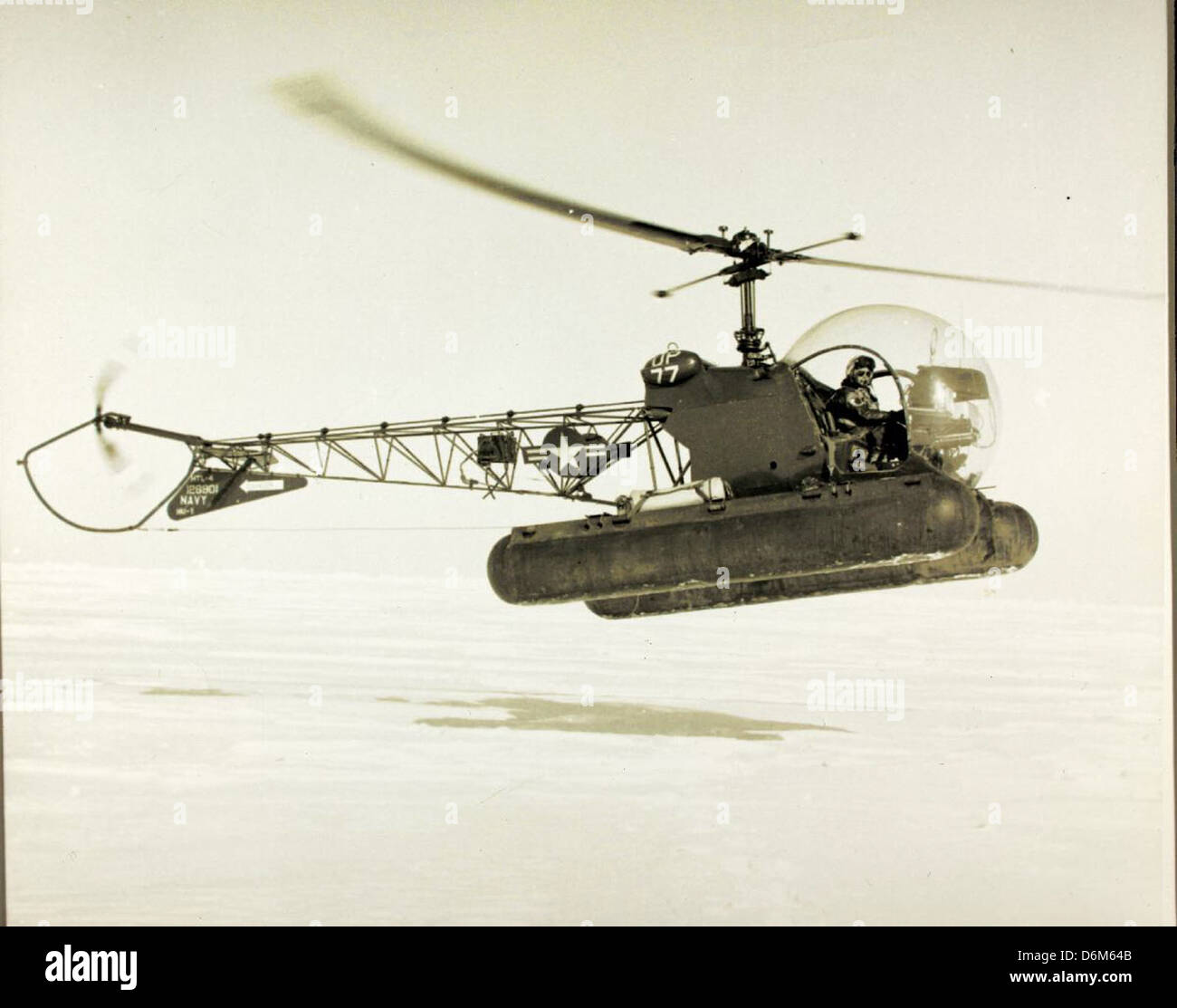 This photo shows HU-1 Detachment 27 personnel aboard helicopters during ...