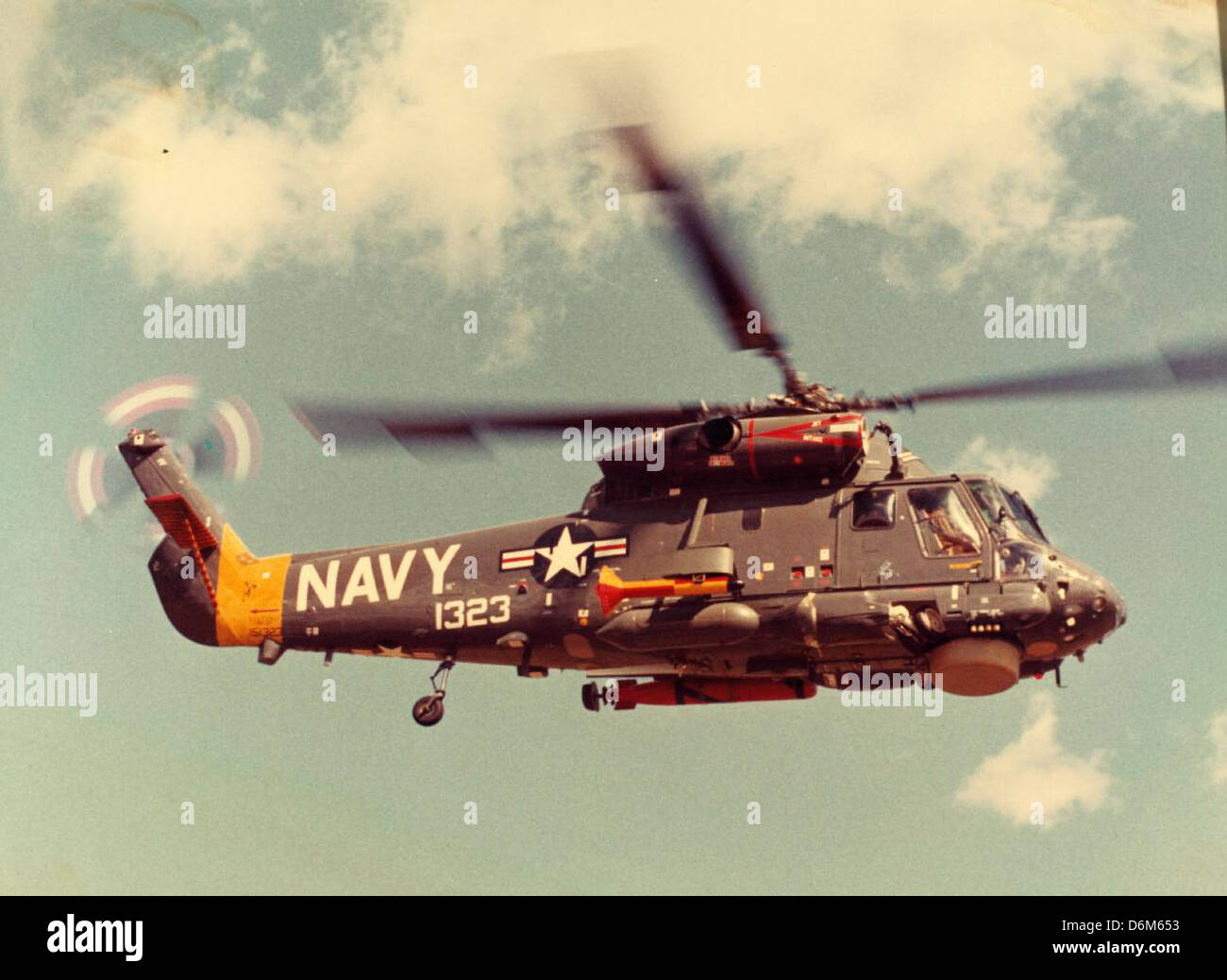 This 1974 image showcases the SH-2F helicopter, an important naval ...
