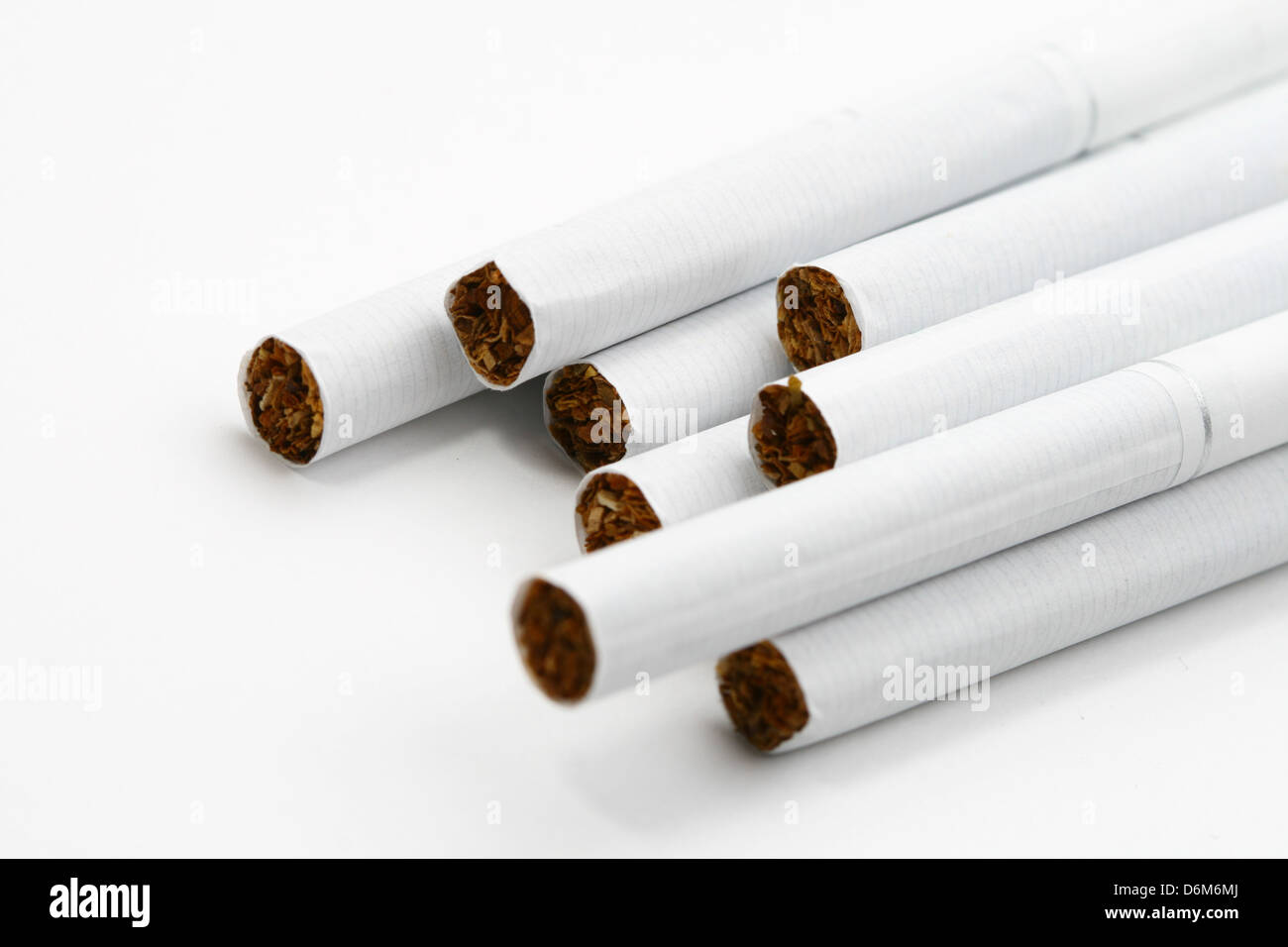 cigarette macro close up on white background Stock Photo - Alamy