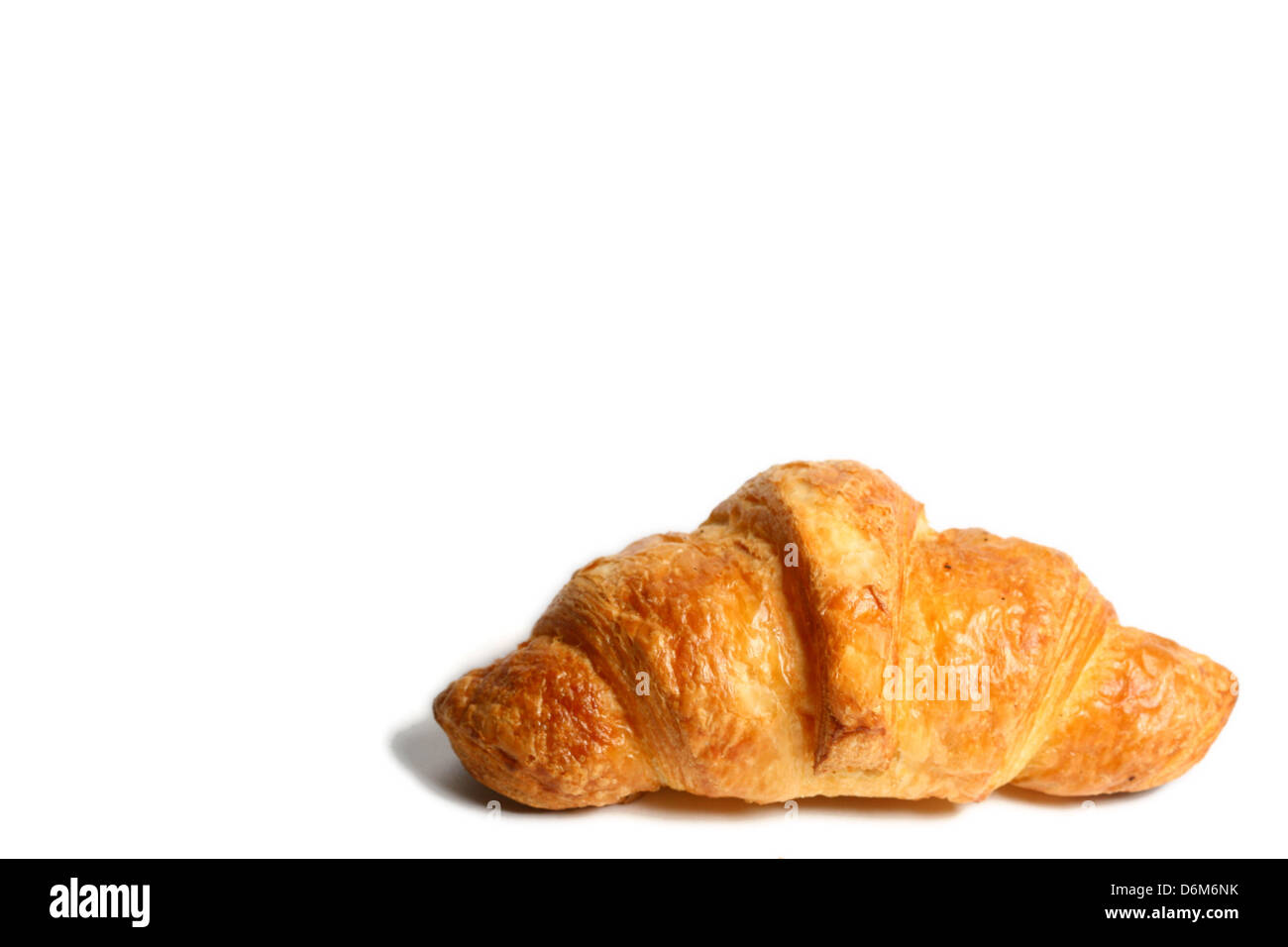Croissant isolated on white background macro Stock Photo - Alamy