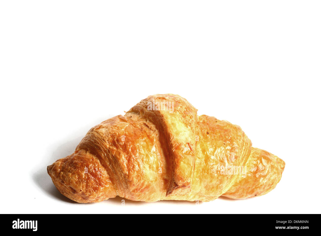 Croissant isolated on white background macro Stock Photo - Alamy
