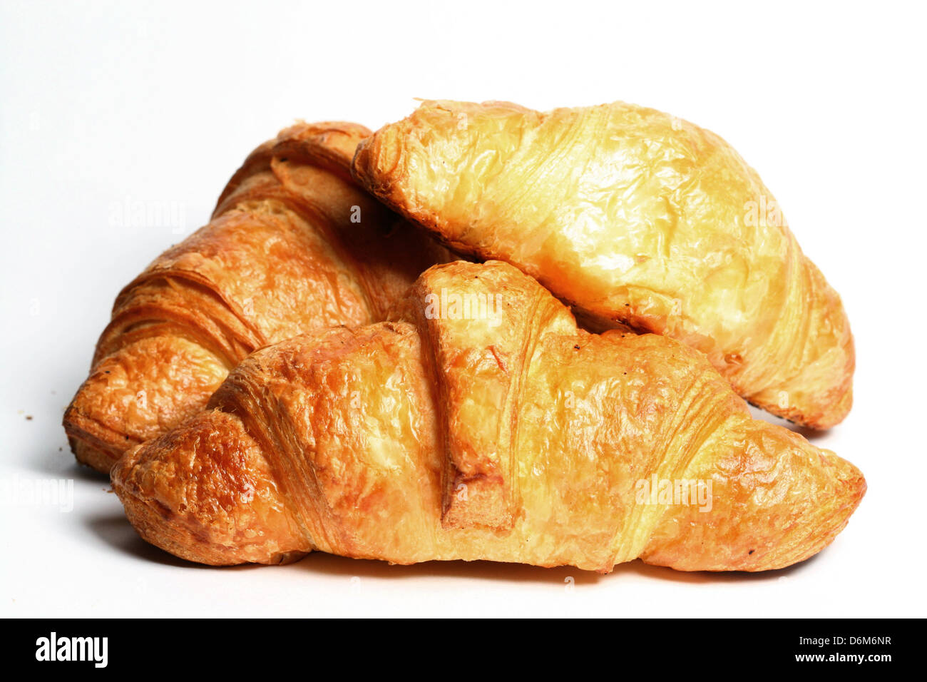 Croissant isolated on white background macro Stock Photo - Alamy