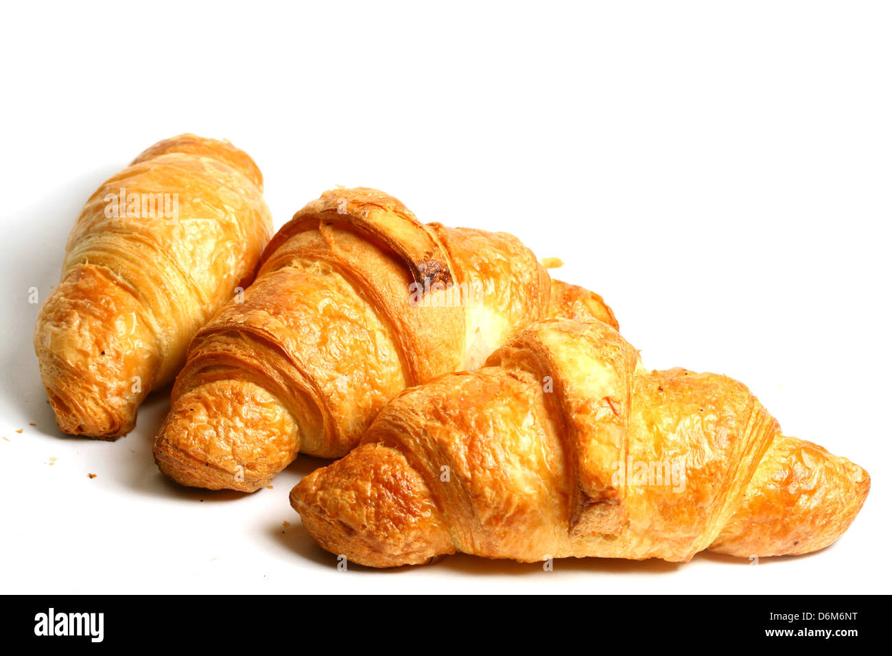 Croissant isolated on white background macro Stock Photo - Alamy