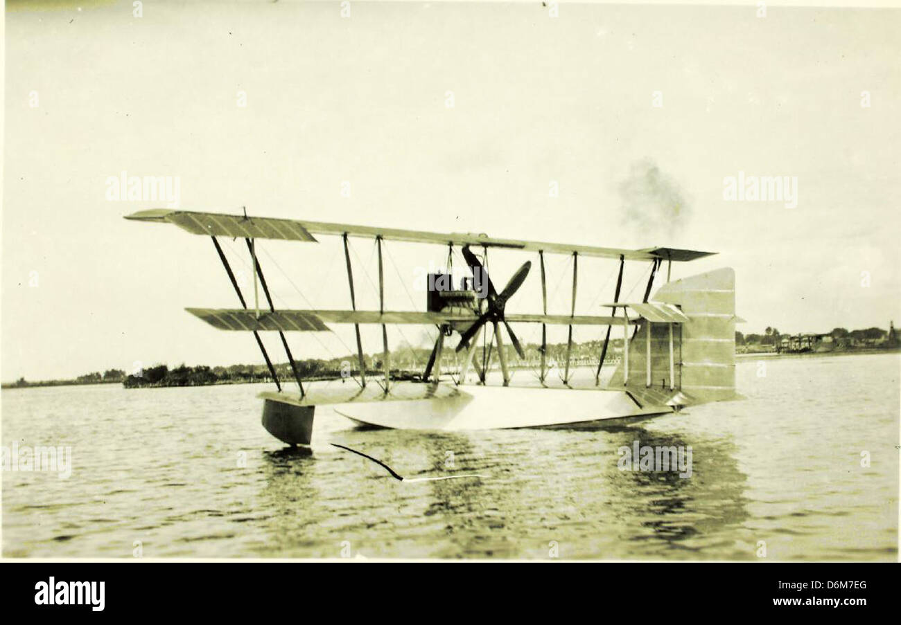 This image features a triplane flying boat, a unique design combining ...