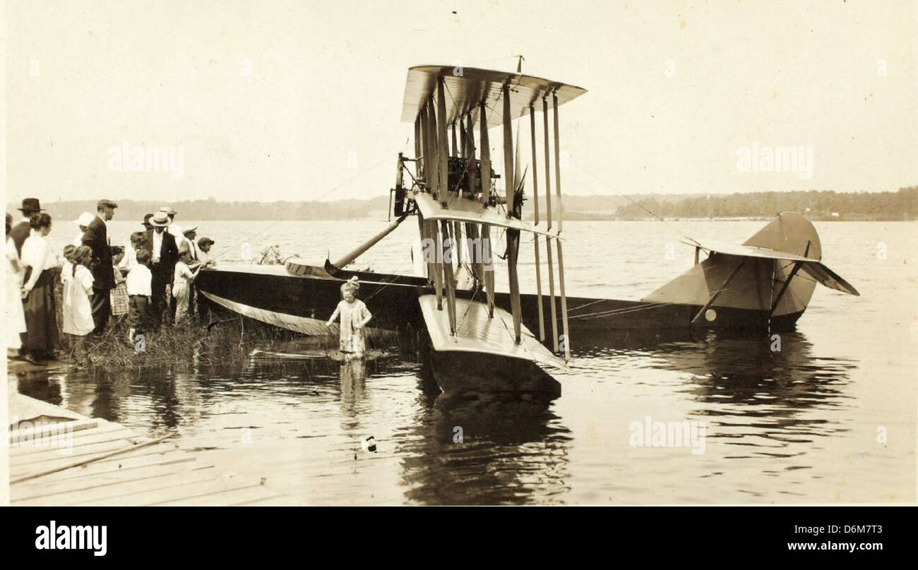 This photo features a triplane flying boat, an experimental aircraft ...