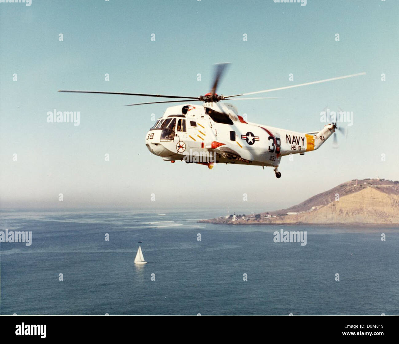 Air-to-air photo of HS-10 SH-3D helicopter in flight past Pt. Loma, CA ...