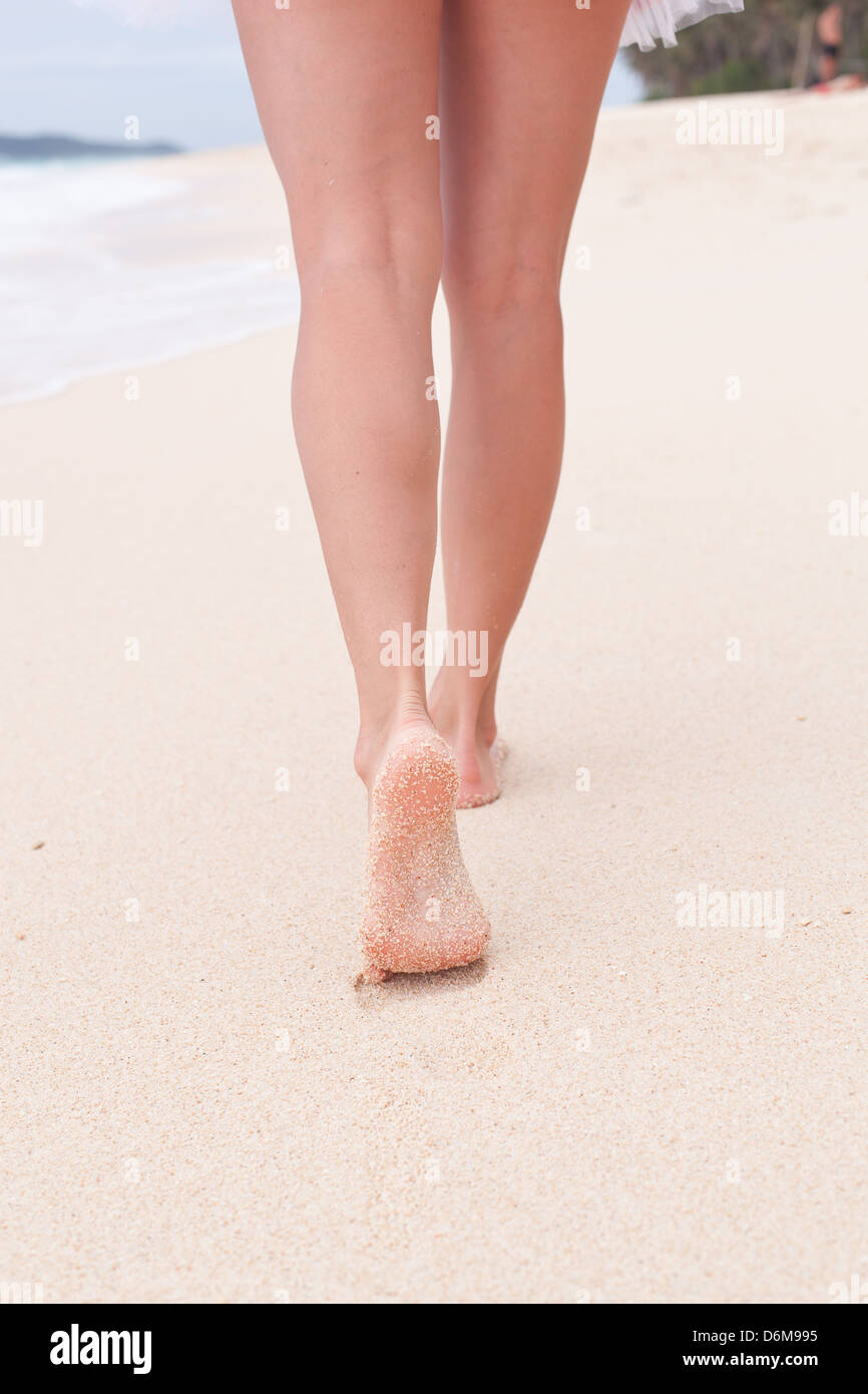 Legs woman on beach hi-res stock photography and images - Alamy