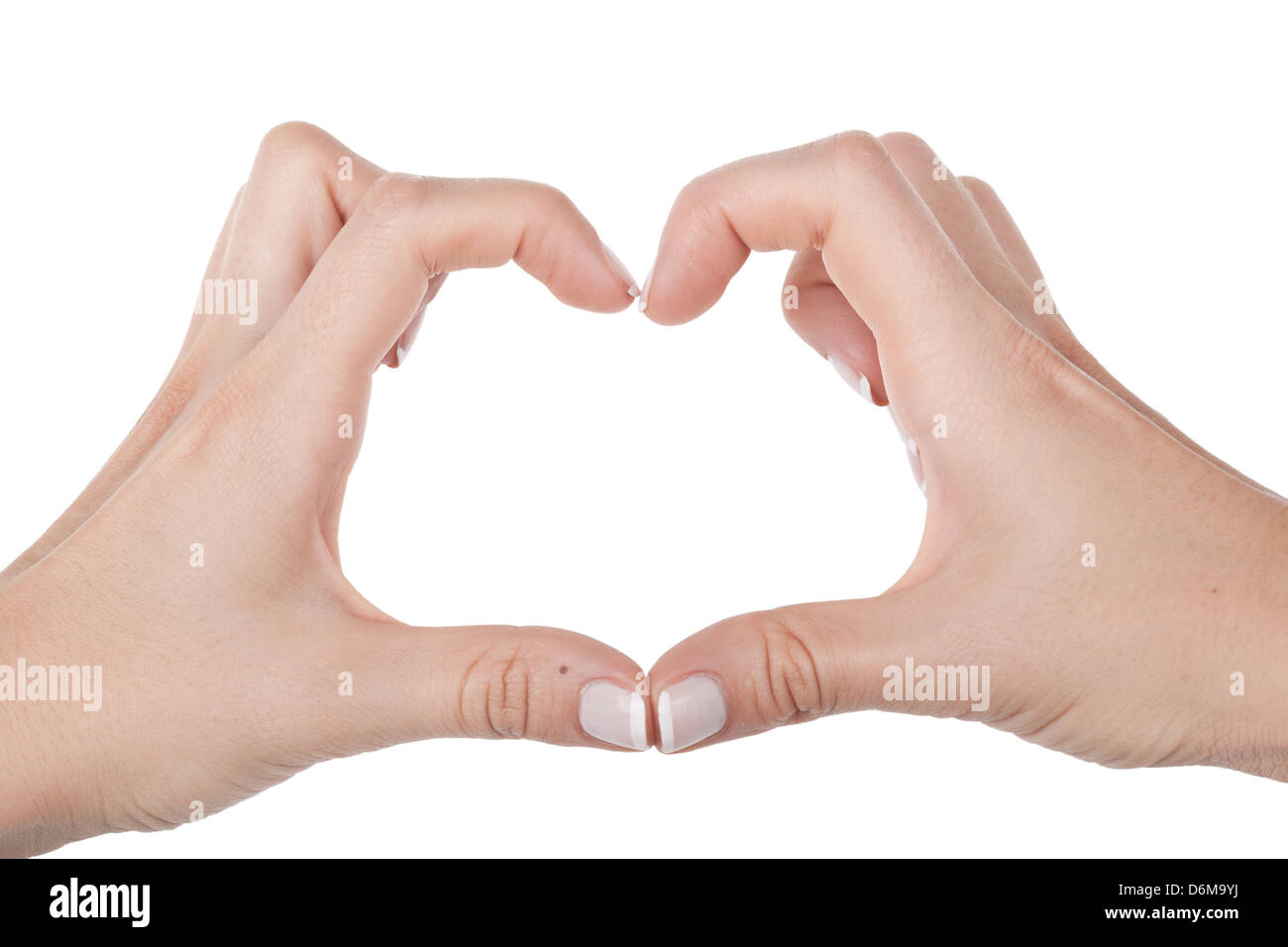 Woman hand shows heart, closeup on white background Stock Photo - Alamy