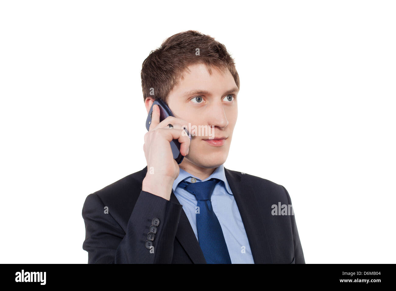 young businessman with smartphone on a whte background Stock Photo - Alamy