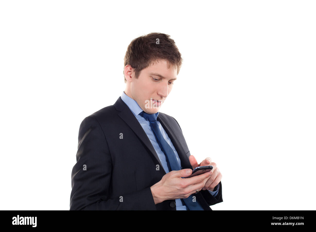 young businessman with smartphone on a whte background Stock Photo - Alamy