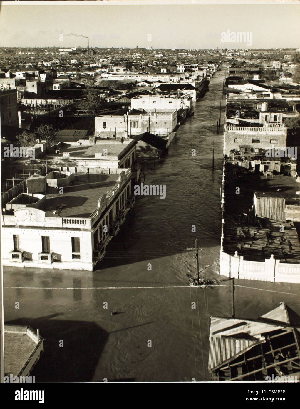 This aerial photograph shows the aftermath of Hurricane Janet, which ...
