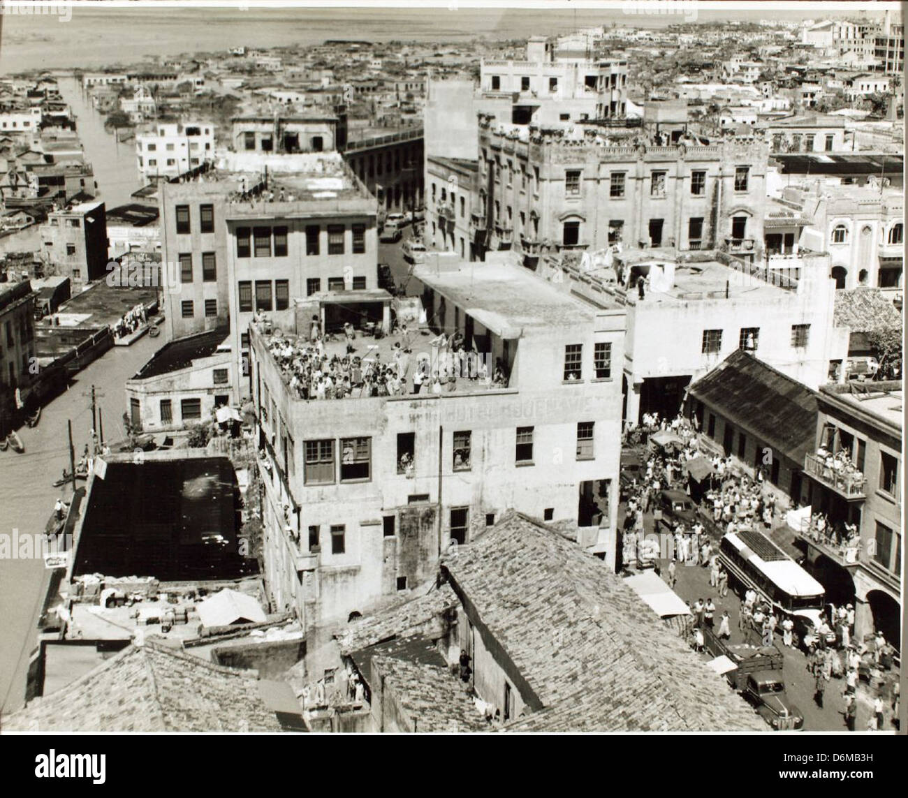 This historical photo shows people stranded on rooftops in Tampico ...