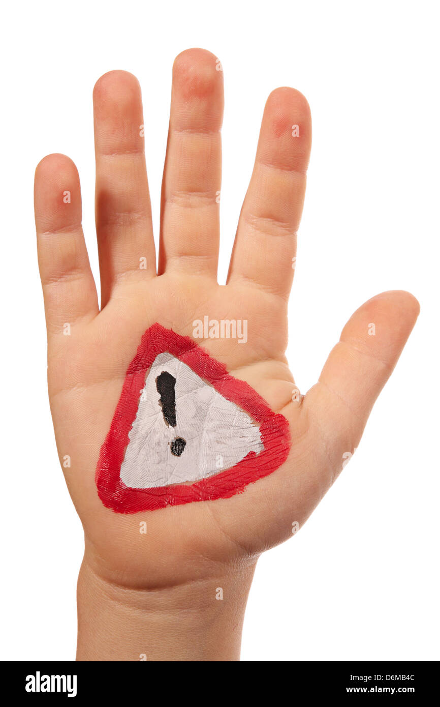 Hand with the drawn traffic sign warning of dangers. Isolated on a ...