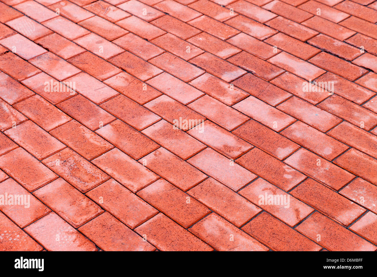 Red paving stones as background Stock Photo - Alamy