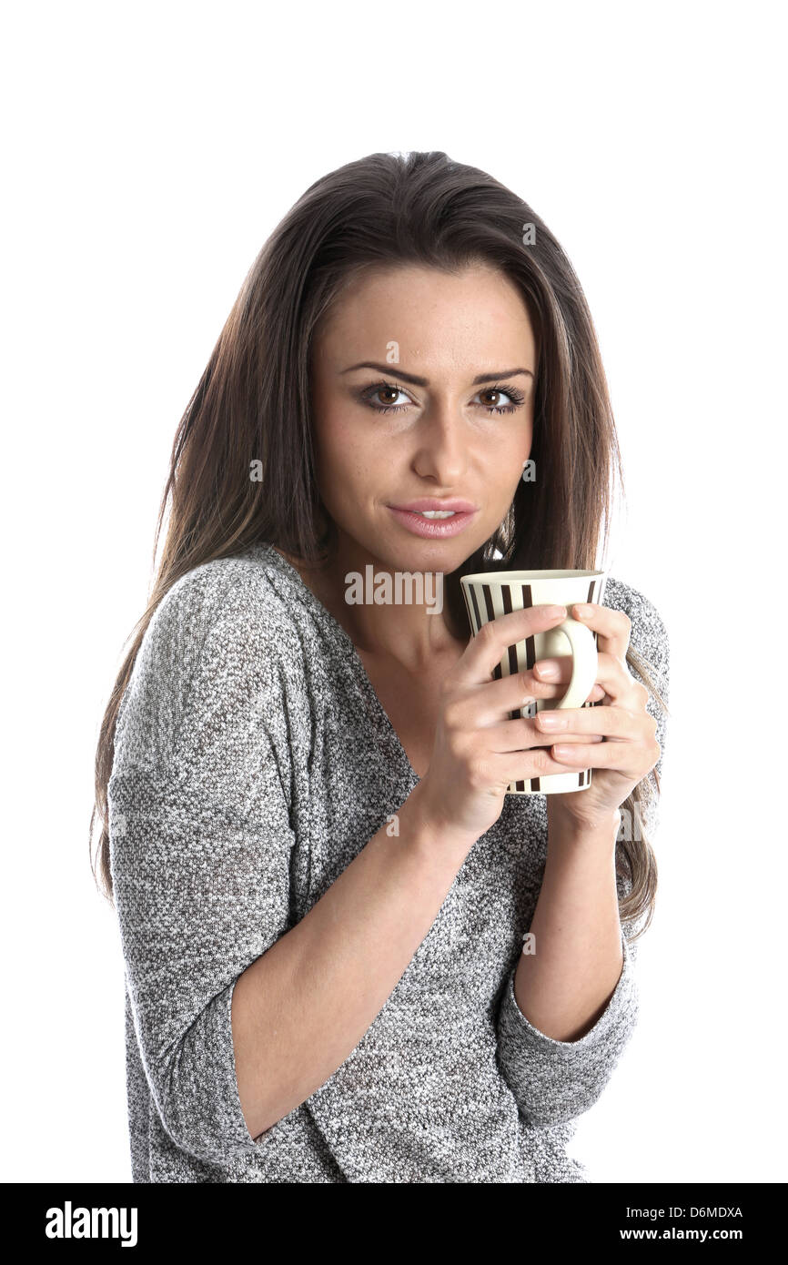 Model Released. Woman Drinking a Mug of Tea Stock Photo - Alamy
