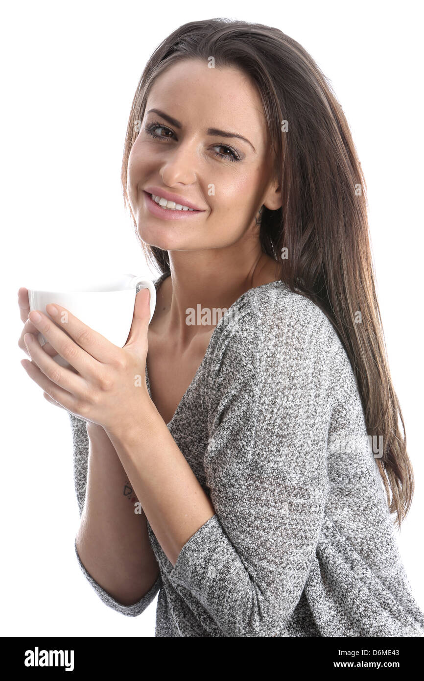 Model Released. Woman Drinking a Mug of Tea Stock Photo - Alamy
