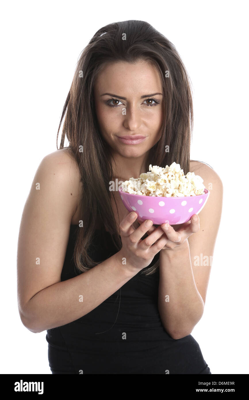 Model Released. Woman Eating Popcorn Stock Photo - Alamy