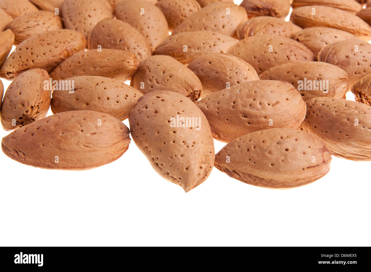 Almonds on white background Stock Photo - Alamy