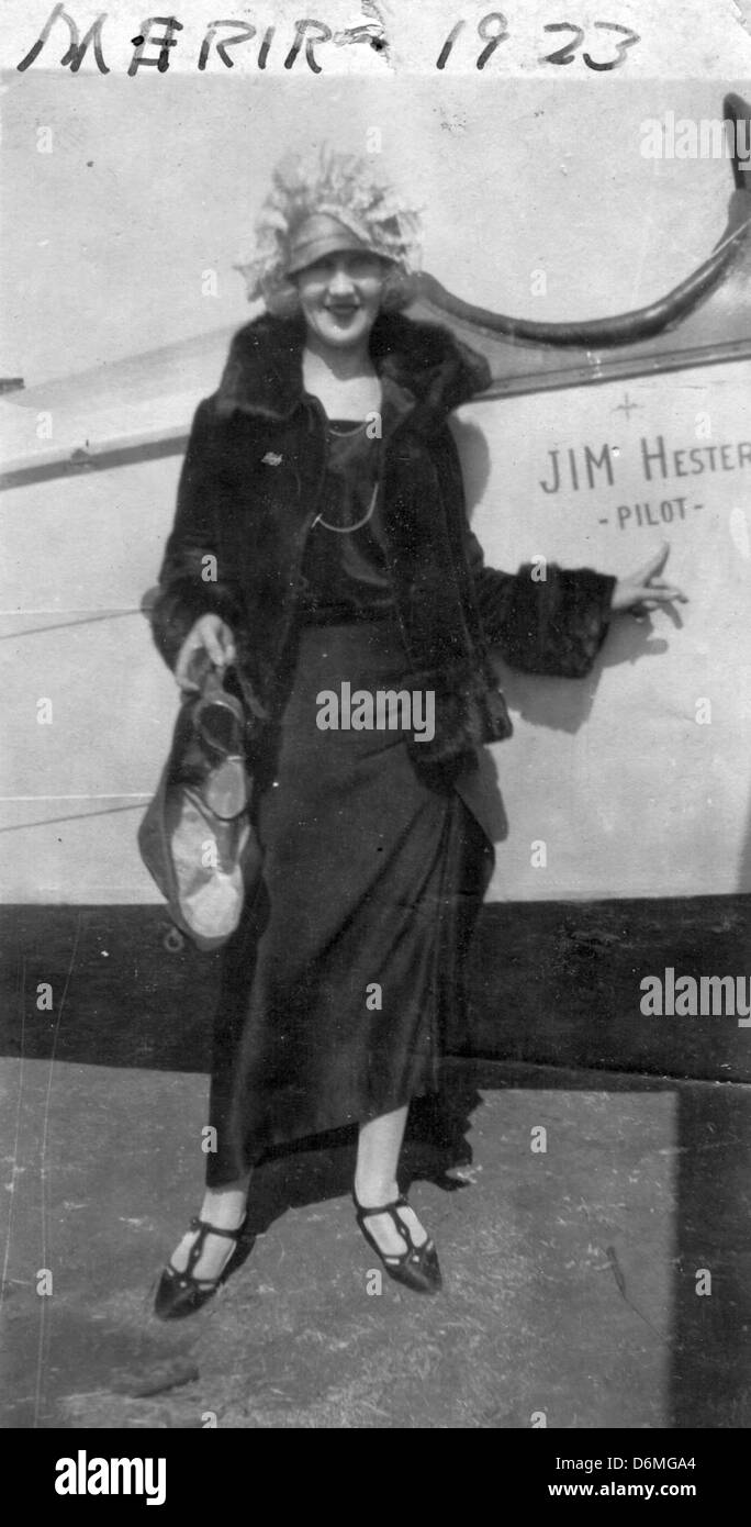 A historical photo from 1923 shows a female aviator standing alongside ...